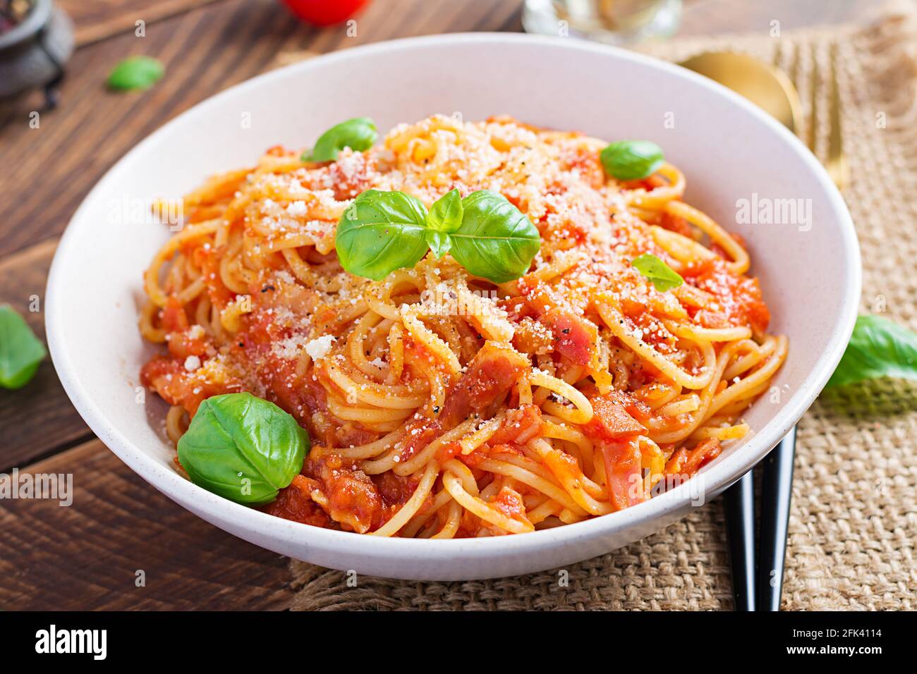 Spaghetti alla Amatriciana with guanciale, tomatoes and pecorino cheese ...
