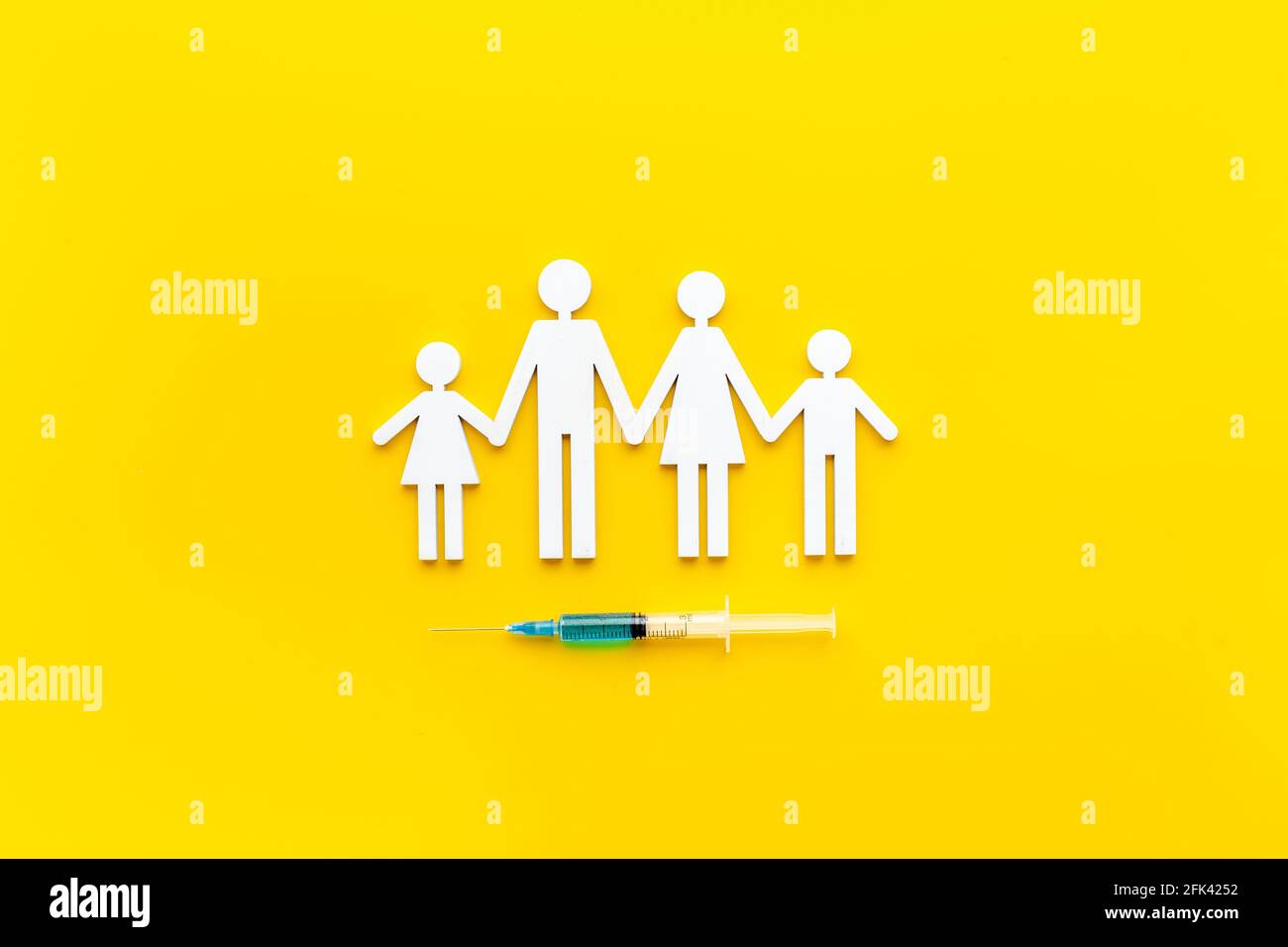 Vaccination concept with family shape. Vaccine vial dose in syringe ...