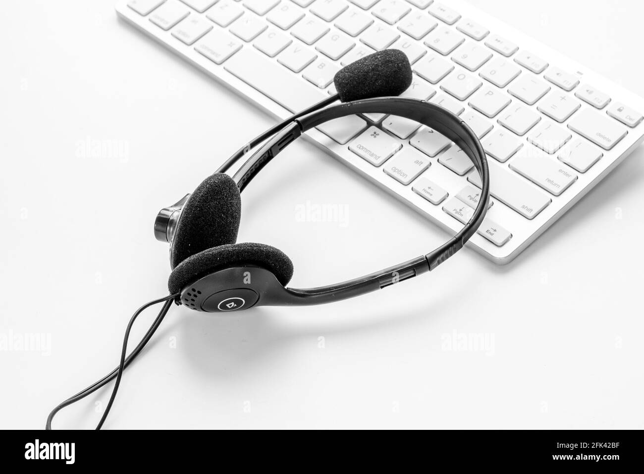 Voip headset on computer laptop. Hotline or call center support Stock ...