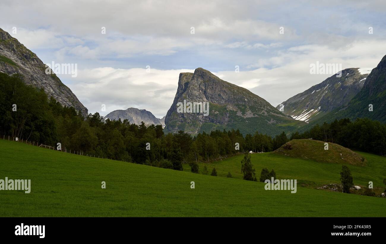 Beautiful mountainous landscape with greenery and cabins in Western ...