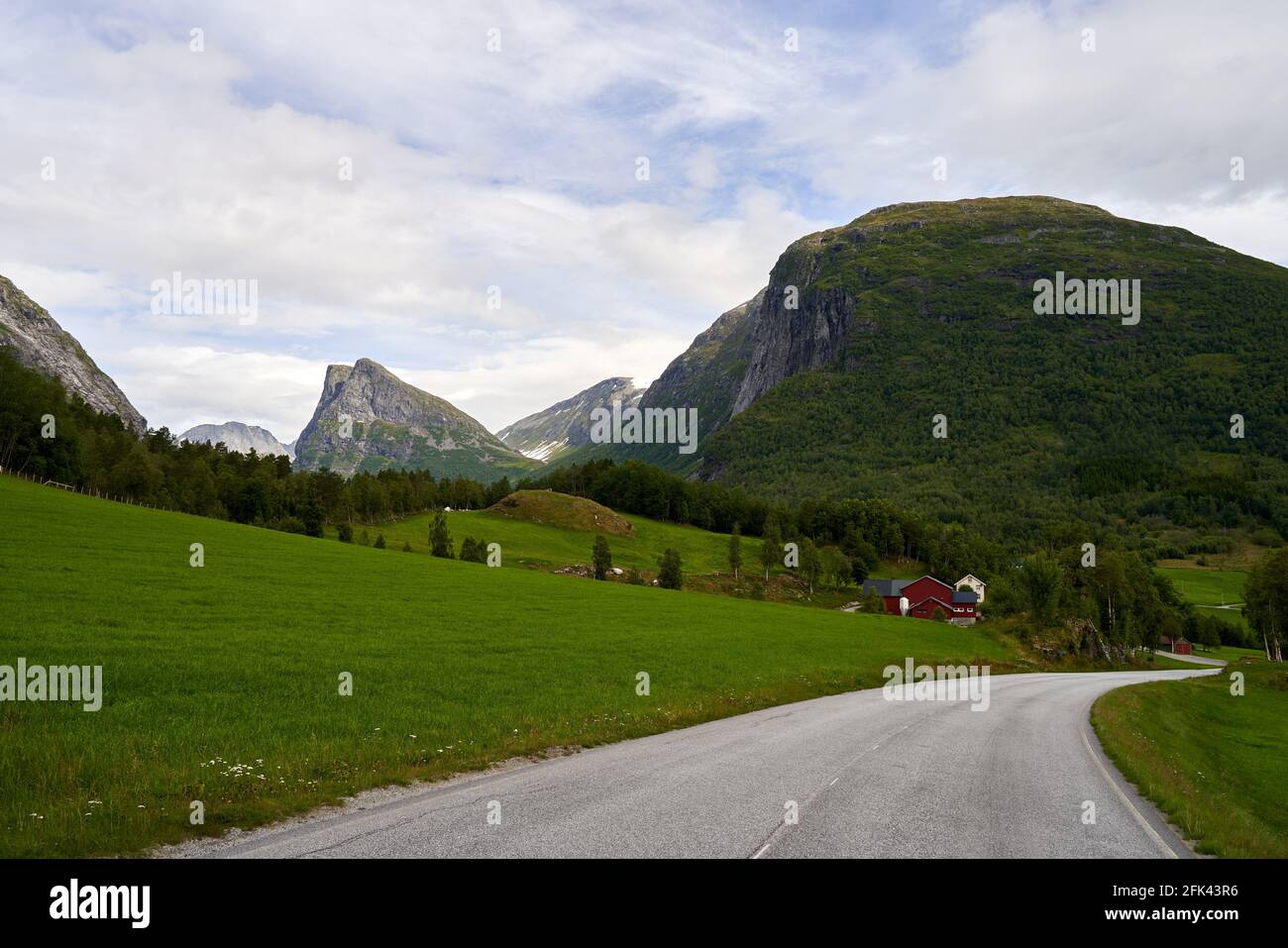 Beautiful mountainous landscape with greenery and cabins in Western ...