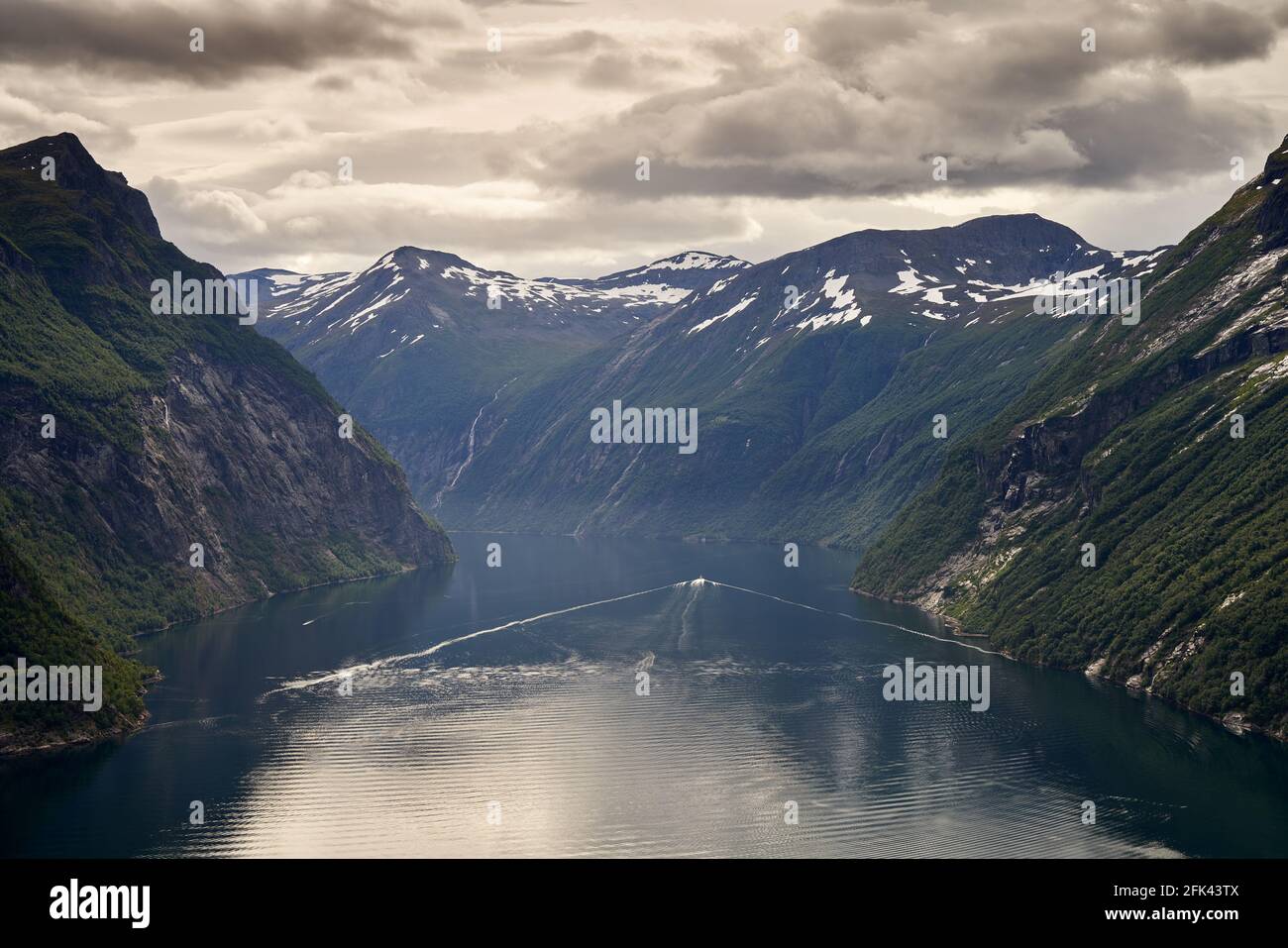 Beautiful view of Norwegian fjords under a cloudy sky in midfjord near ...