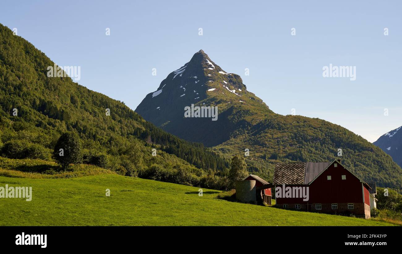 Beautiful mountainous landscape with greenery and cabins in Western ...