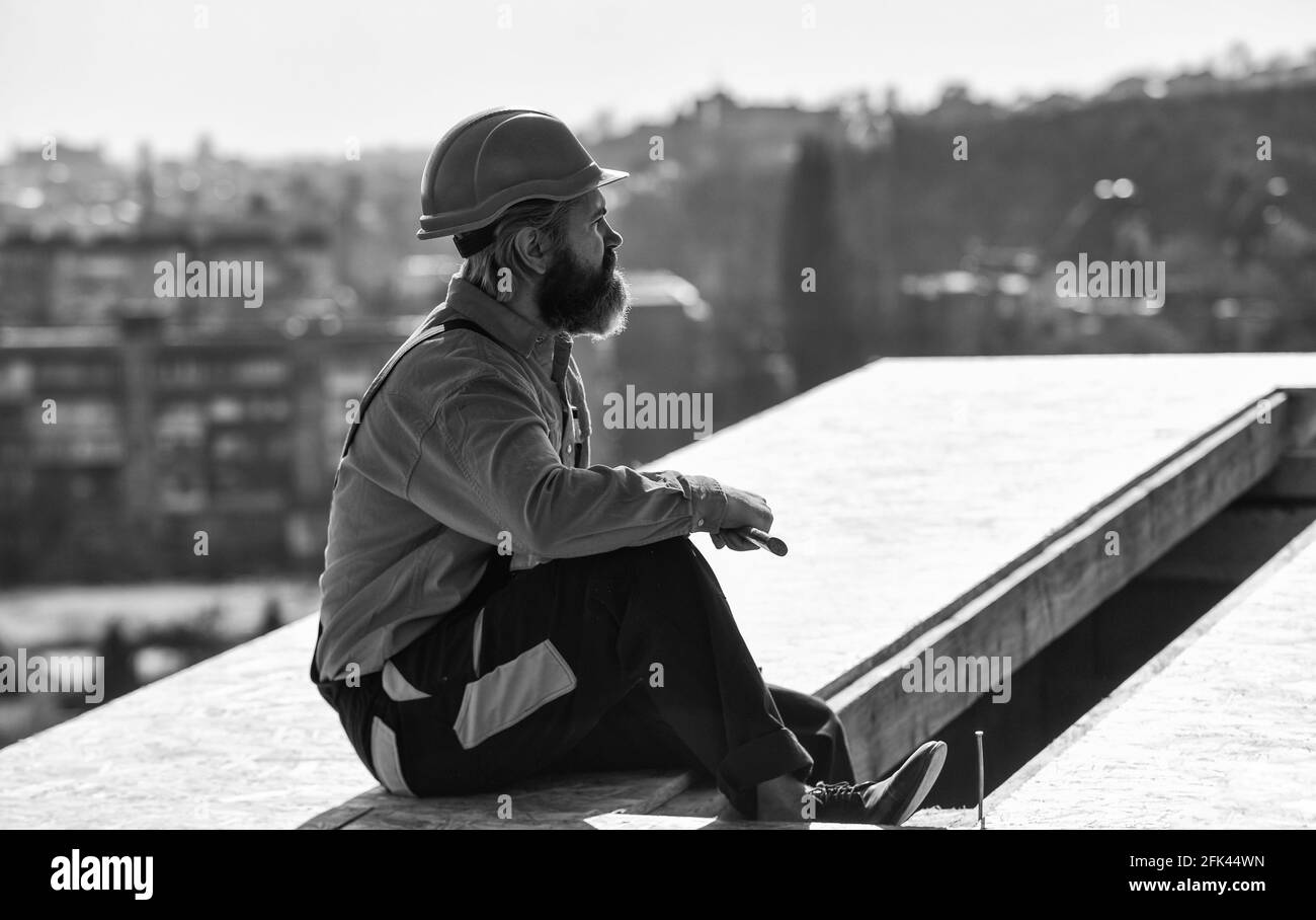 Roofer working. Roofer working tool. Construction Industry and ...