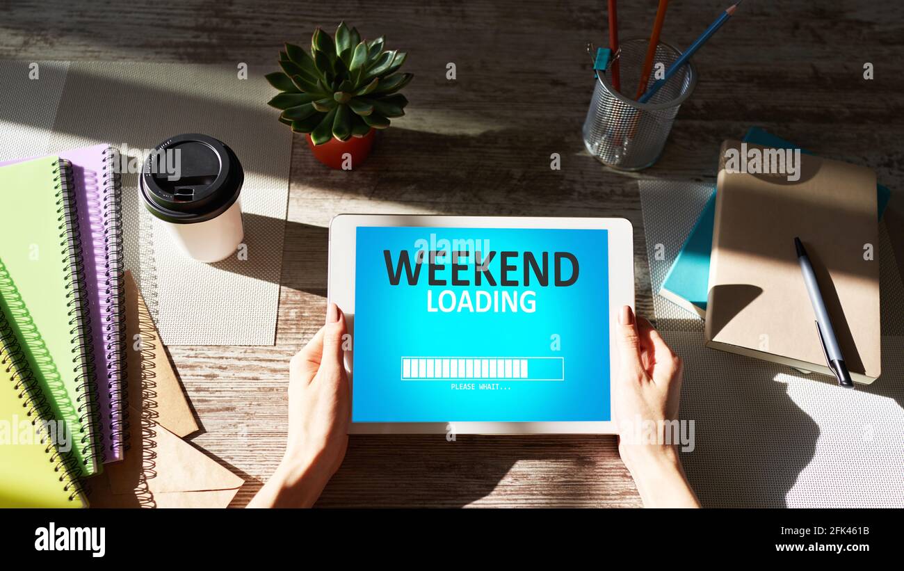 Weekend loading status bar message on device screen Stock Photo - Alamy