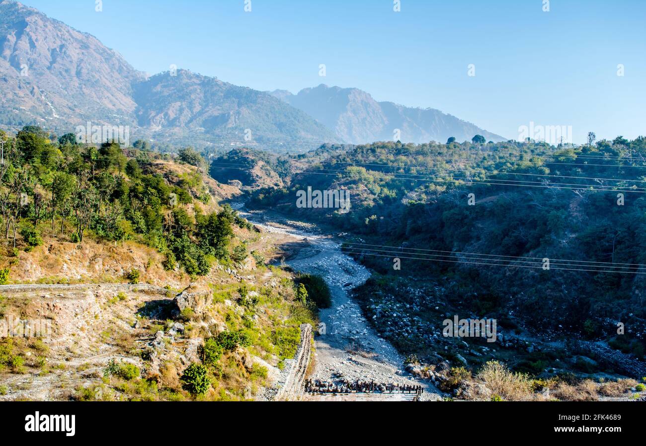 Scenic Aerial Scene - River between two mountains of himalayas, aerial ...