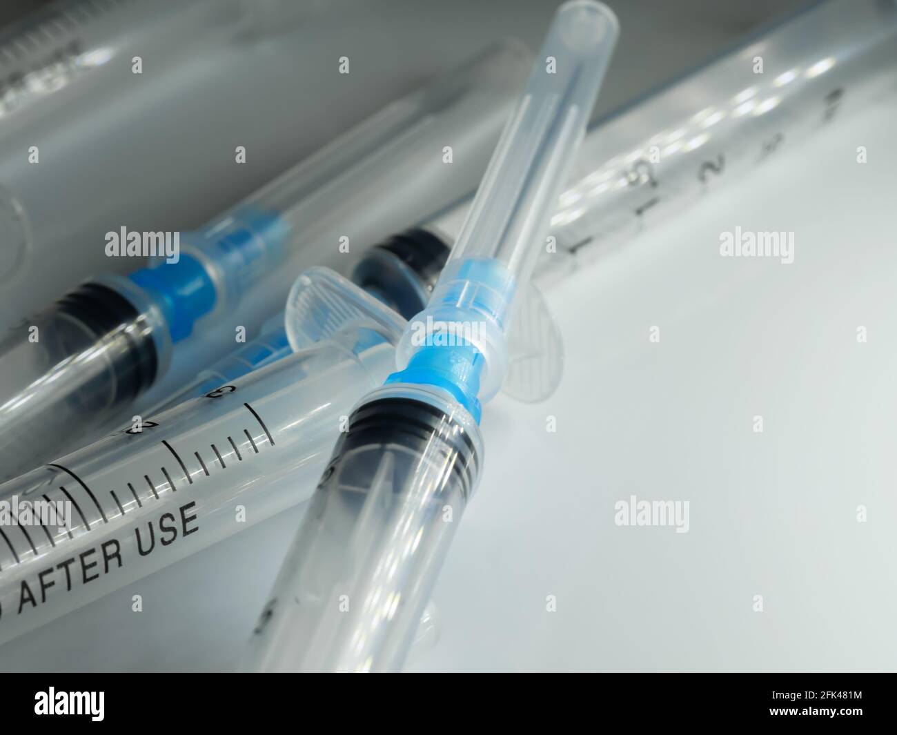 Several syringe on white table prepared for injection in hospital ...