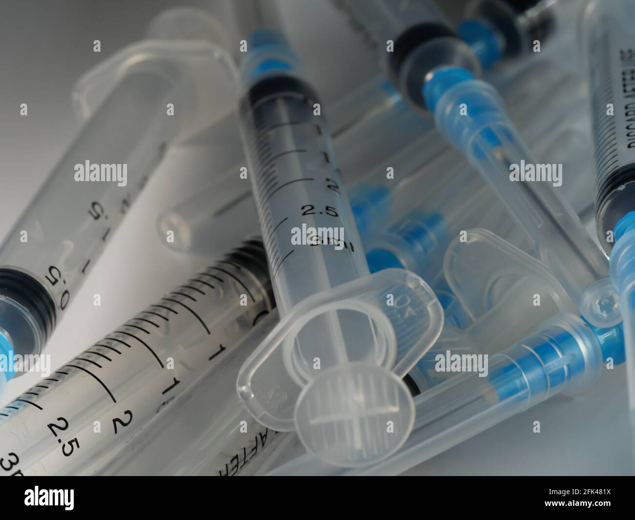 Several syringe on white table prepared for injection in hospital ...