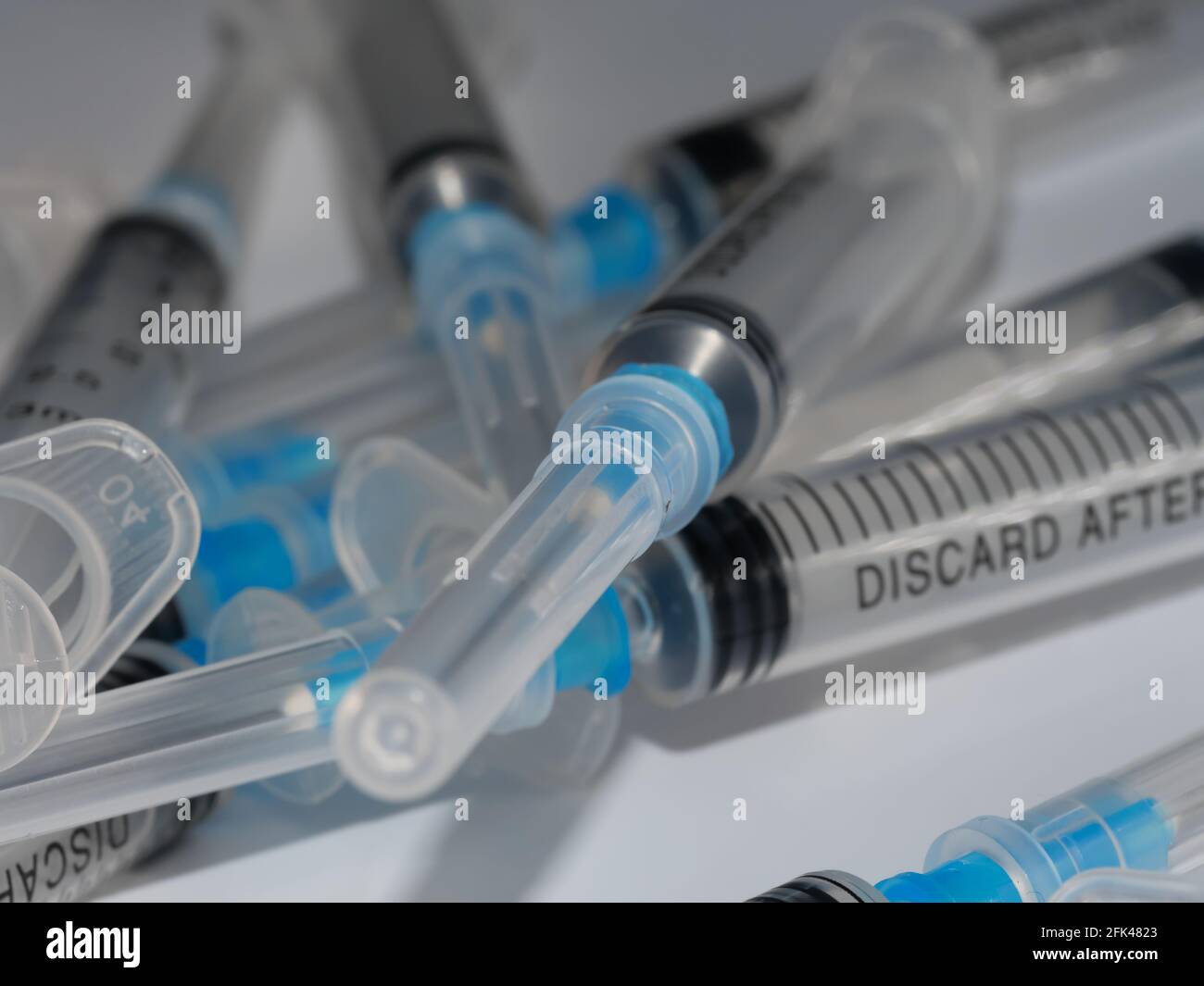 Several syringe on white table prepared for injection in hospital ...