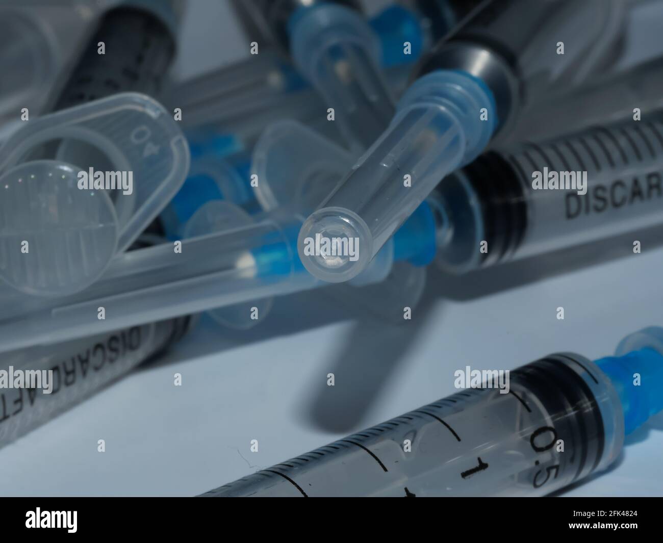 Several syringe on white table prepared for injection in hospital ...