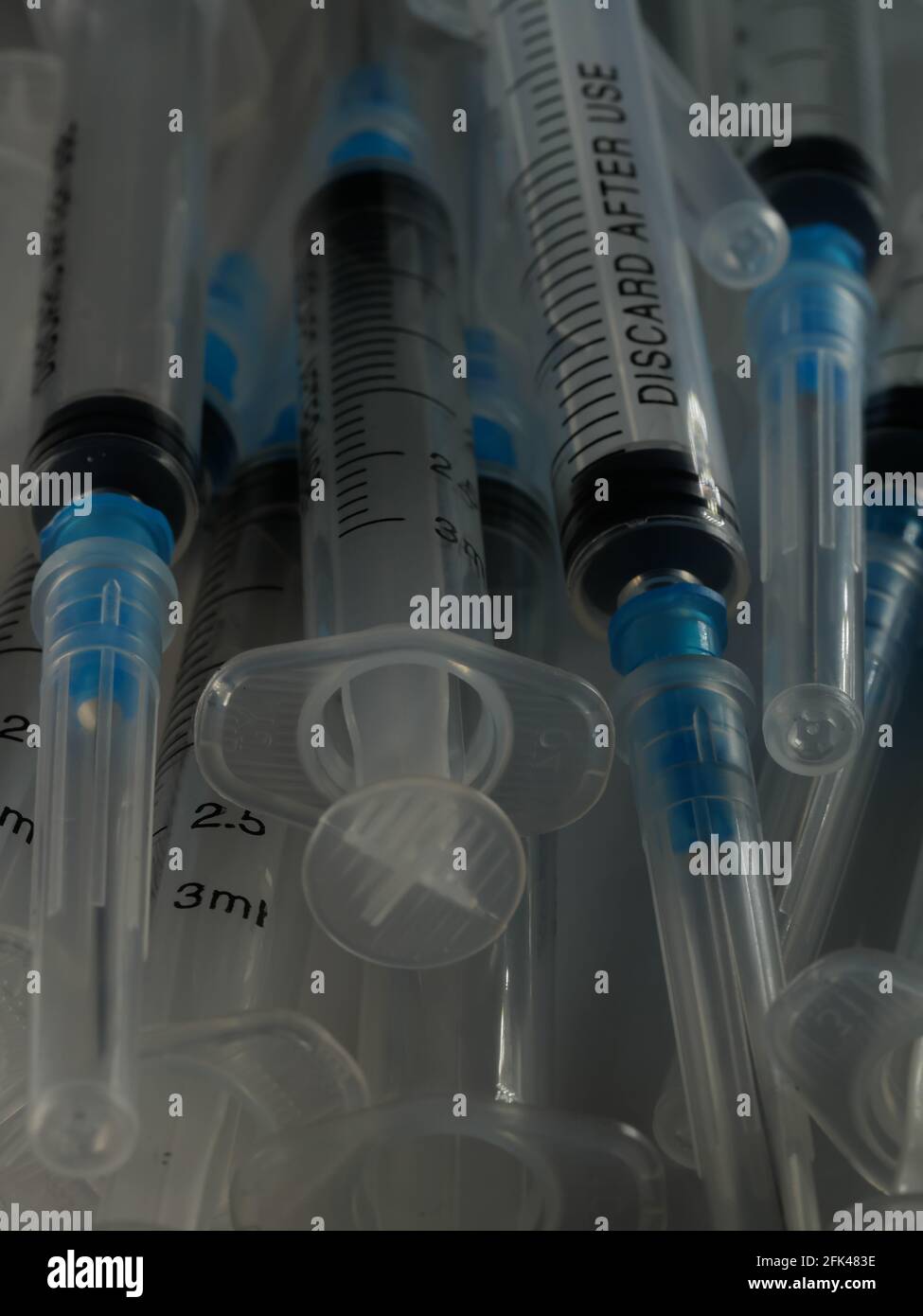 Several syringe on white table prepared for injection in hospital ...