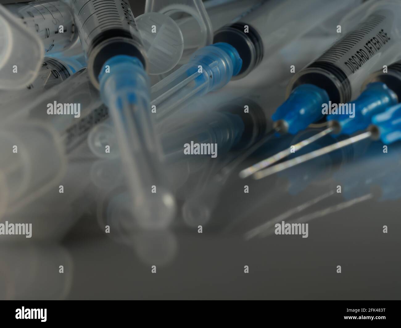 Several syringe on white table prepared for injection in hospital ...