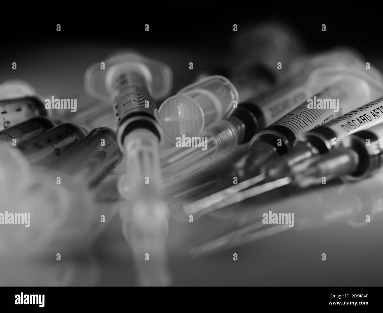 Several syringe on white table prepared for injection in hospital ...