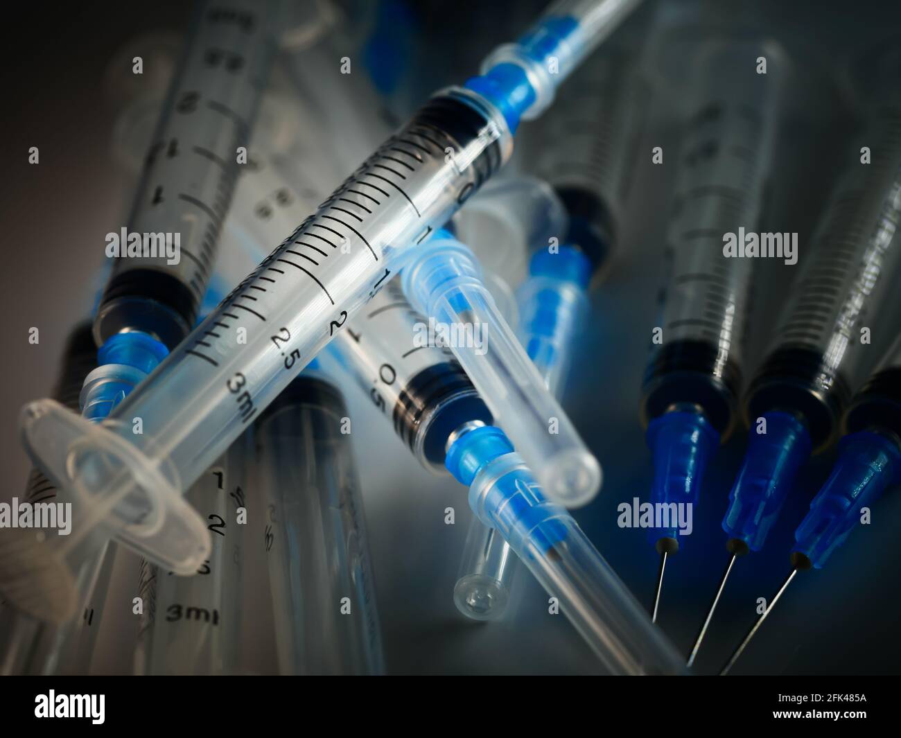 Several syringe on white table prepared for injection in hospital ...