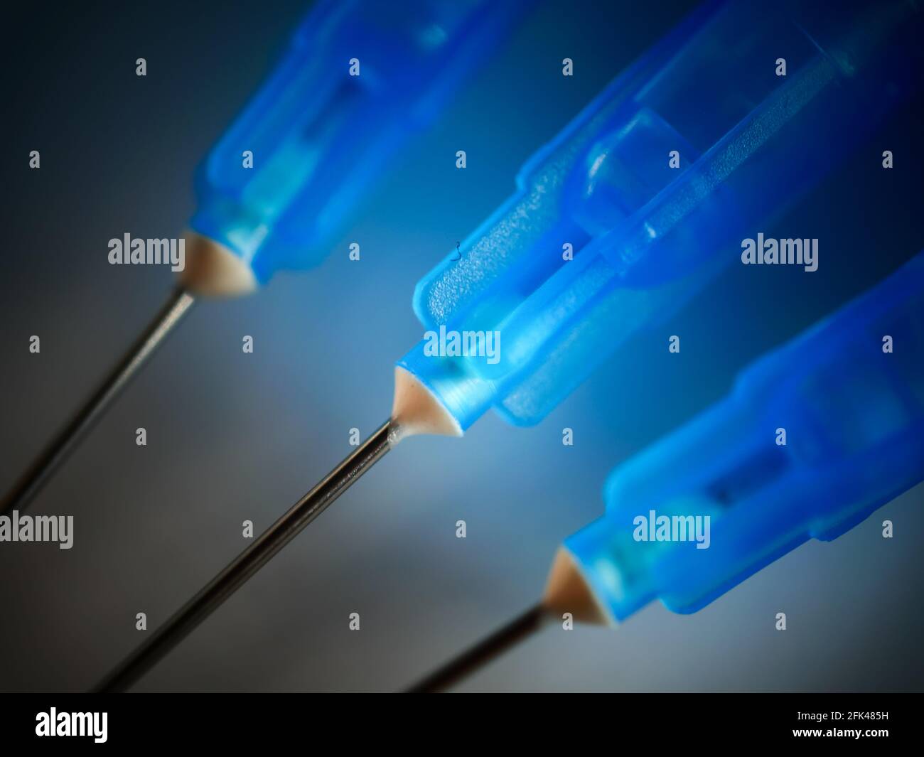 Several syringe on white table prepared for injection in hospital ...