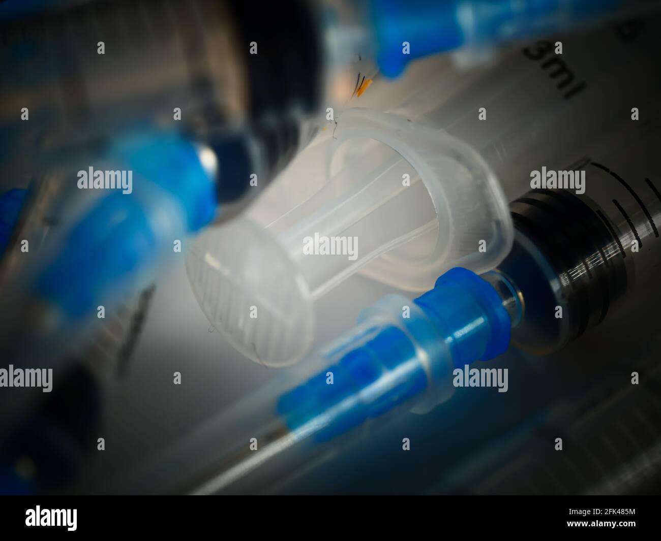 Several syringe on white table prepared for injection in hospital ...