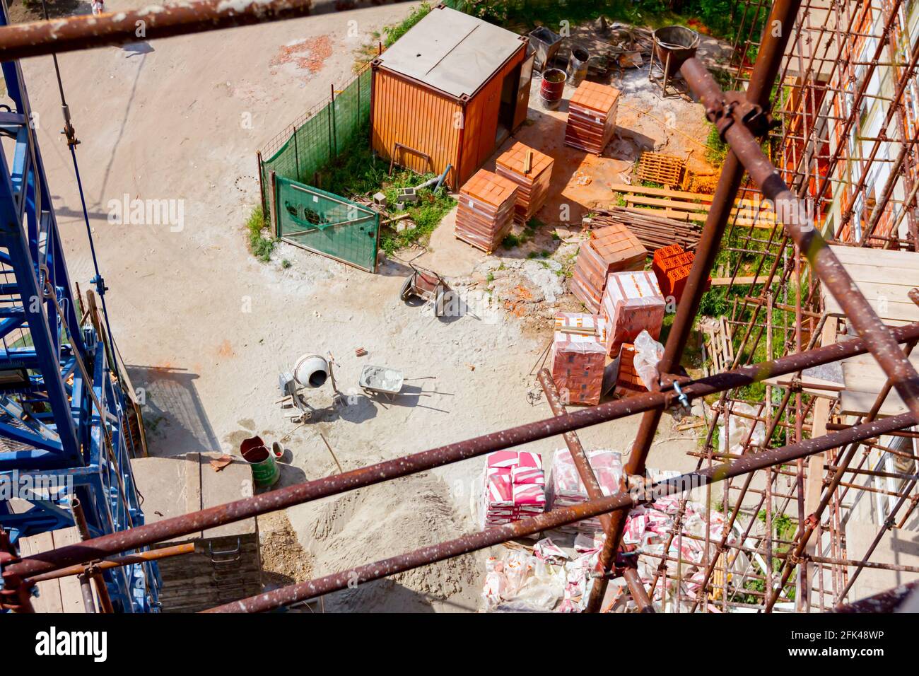 Above view on construction site area, piled resources for building ...
