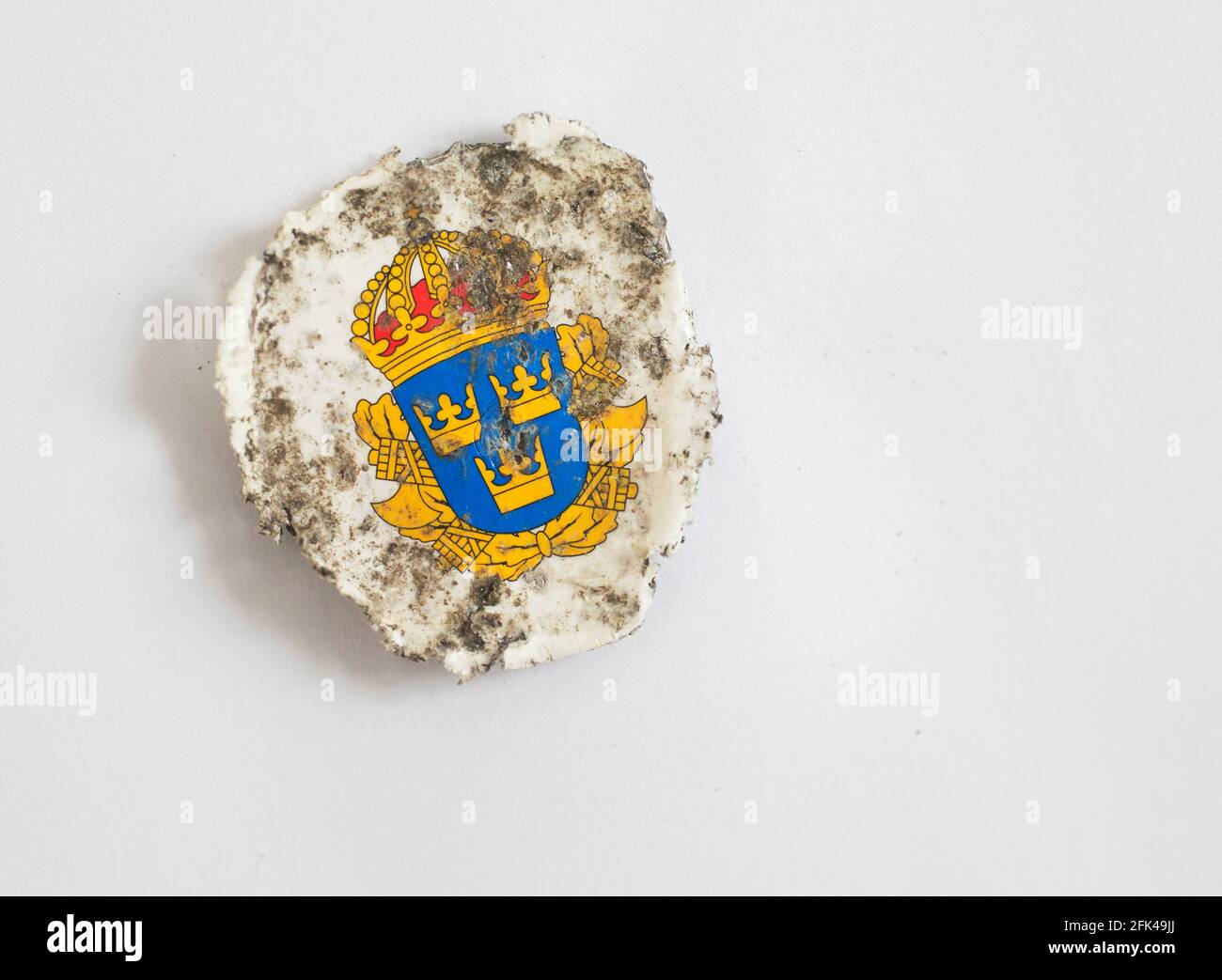 A worn Swedish police emblem Stock Photo - Alamy