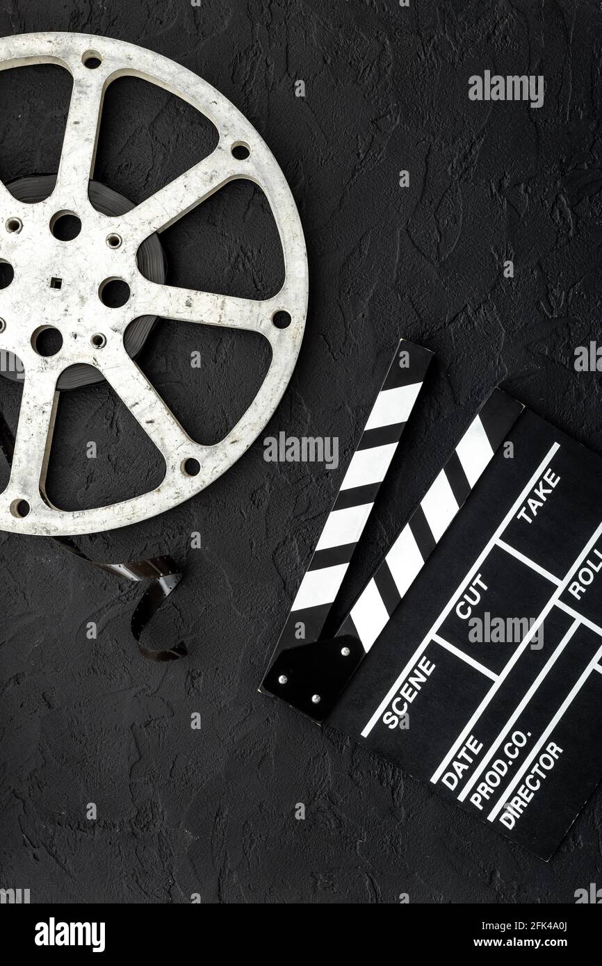 Big film reel with movie clapperboard, top view. Cinema concept Stock ...
