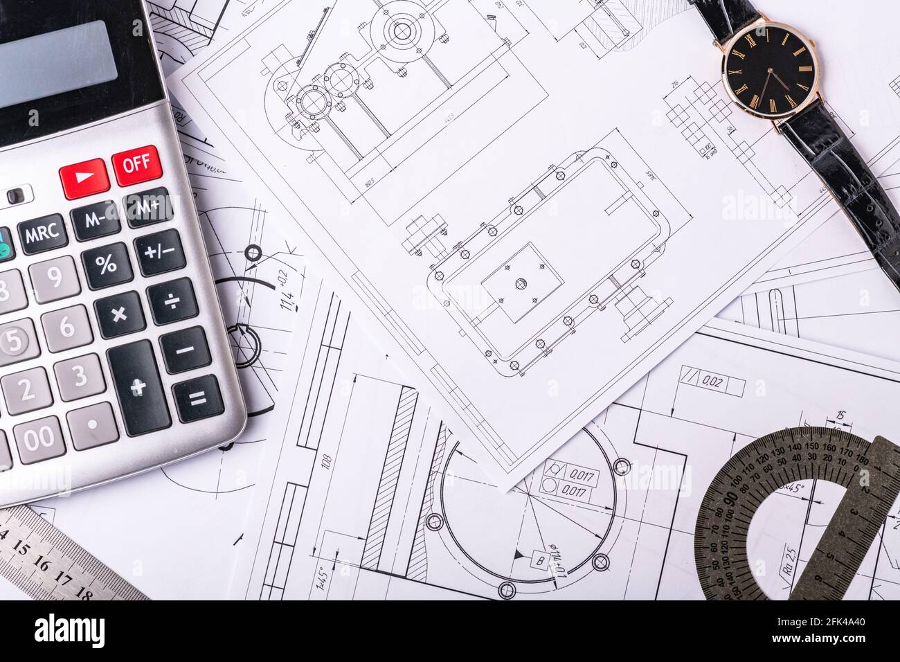 Several Technical engineering drawings, which show mechanical parts ...