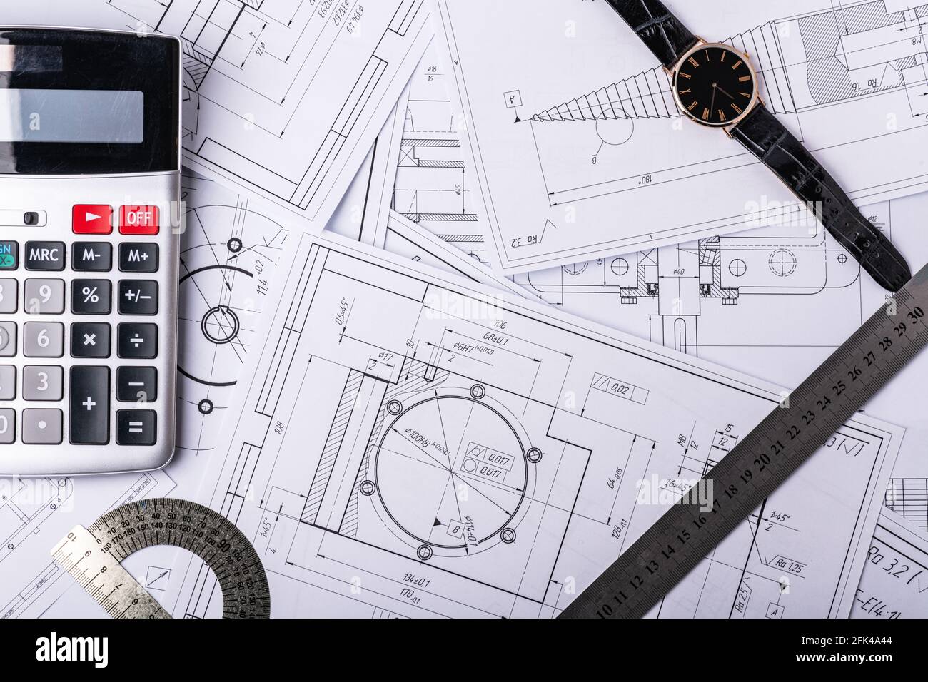 Several Technical engineering drawings, which show mechanical parts ...