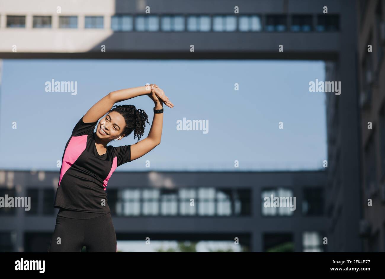 Urban workout in morning, stretching and warm-up outdoor, healthy ...