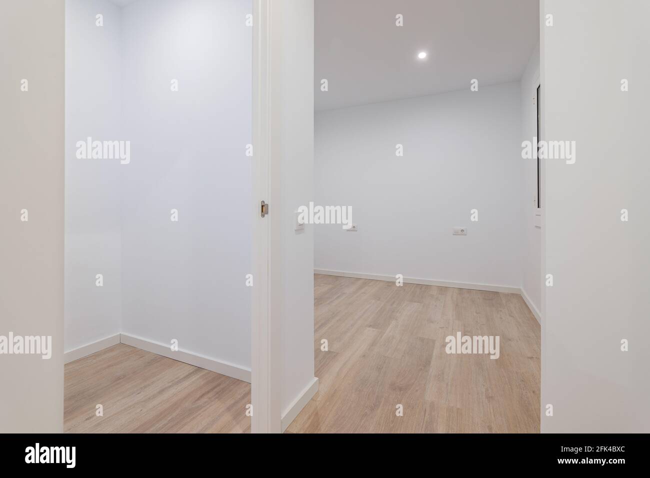 Empty small rooms with white walls. Interior of the freshly renovated ...