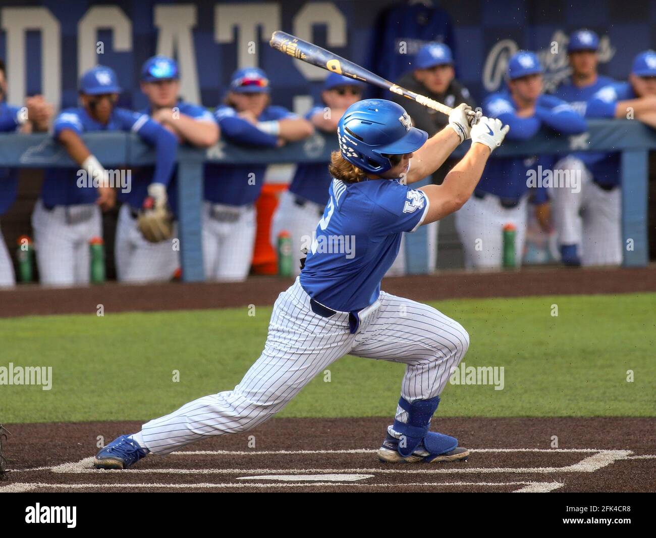 Lexington, KY, USA. 20th Apr, 2021. Kentucky's Austin Schultz swings ...