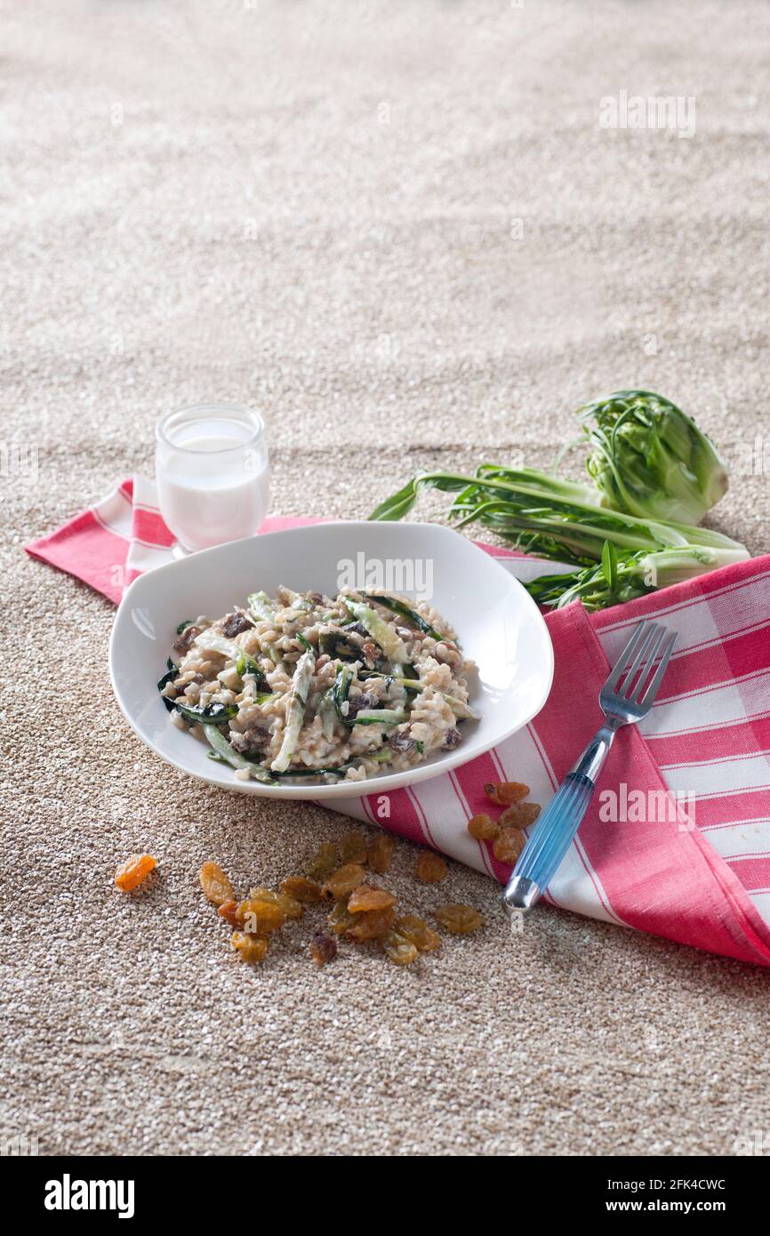 Risotto with sausage and chicory Stock Photo - Alamy