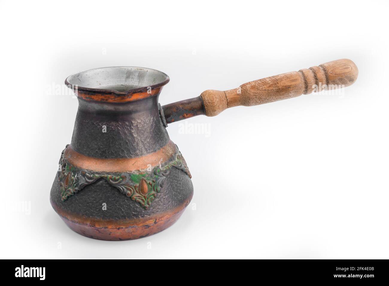 Turkish coffee pot cezve on a white background Stock Photo - Alamy