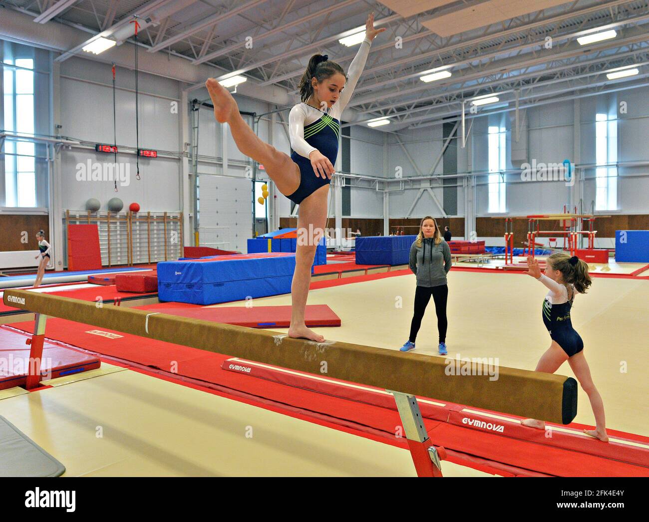 young girls practicing gymnastics Stock Photo - Alamy