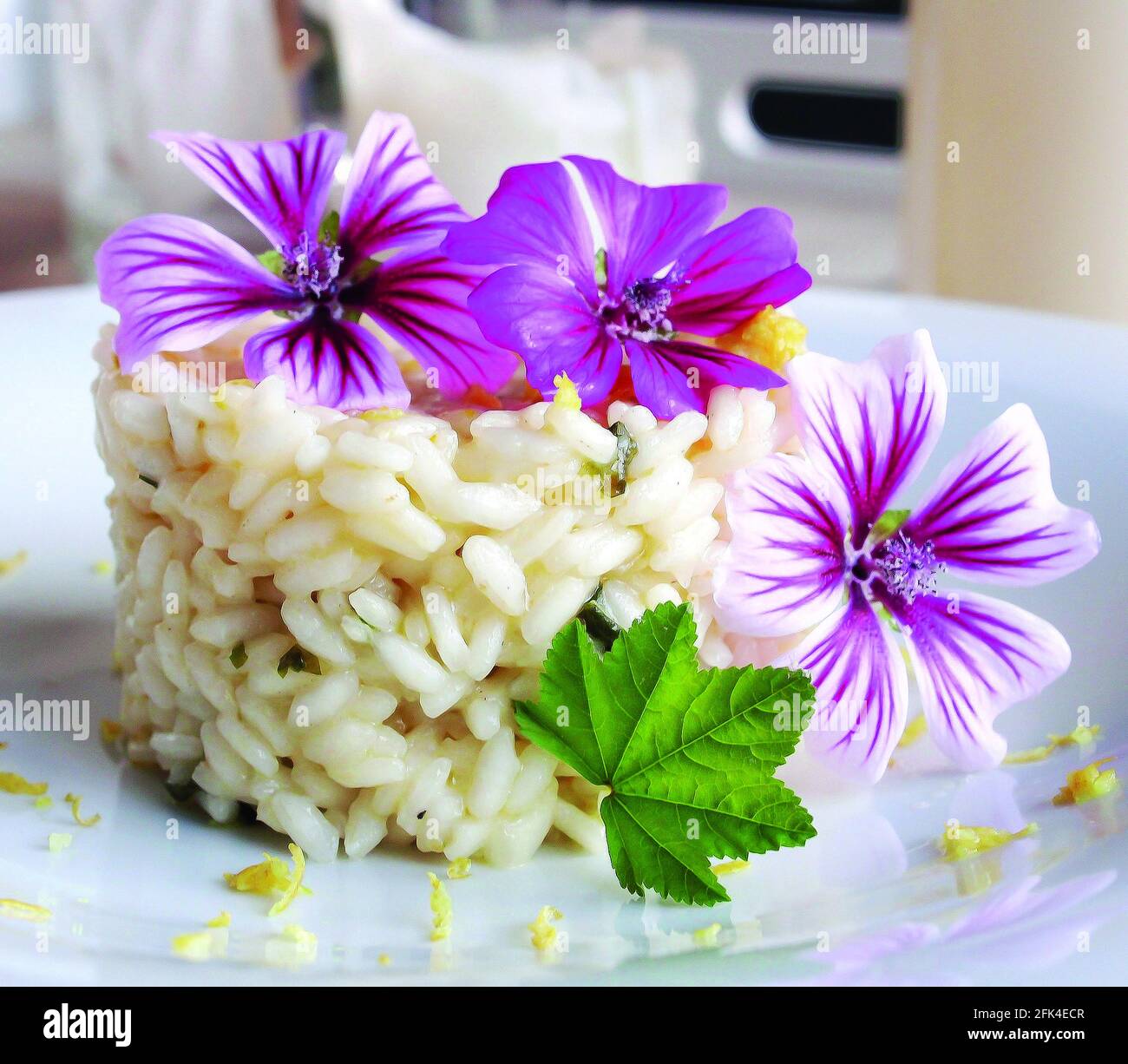 Risotto with malva and lemon Stock Photo - Alamy