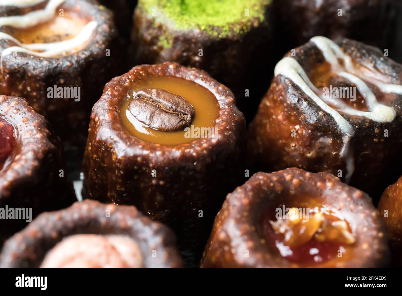 Caneles de bordeaux is a small pastry with rum and vanilla, traditional ...