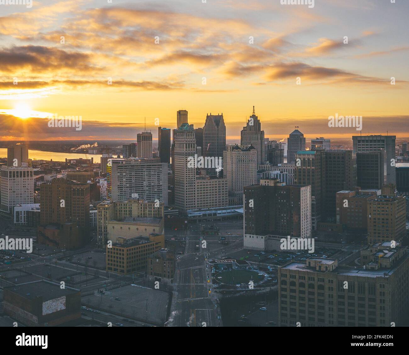 Beautiful sunset sky over a city Stock Photo - Alamy