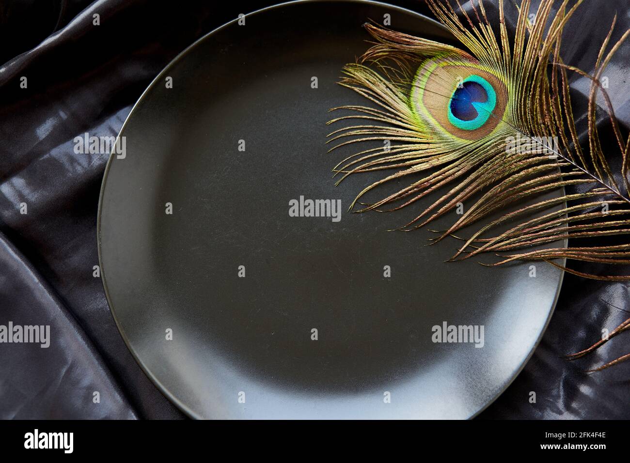 Black template black copy space with peacock feather. Elegant premium ...