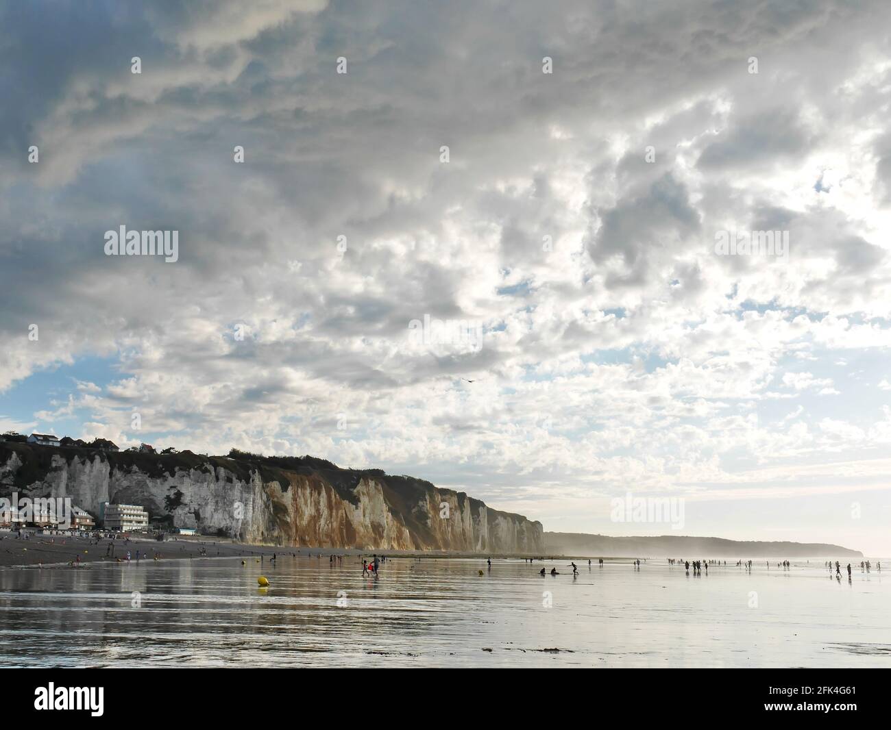 Panoramic view to white cliffs of Dieppe, ocean, silhouettes people ...