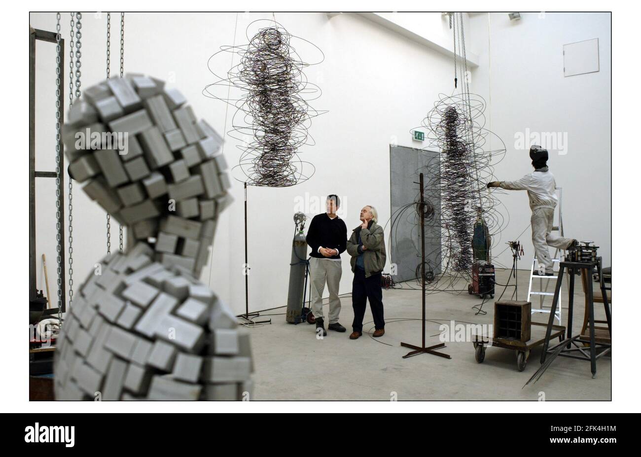 Anthony Gormley in his studio in north London......with Hugh Brody who ...