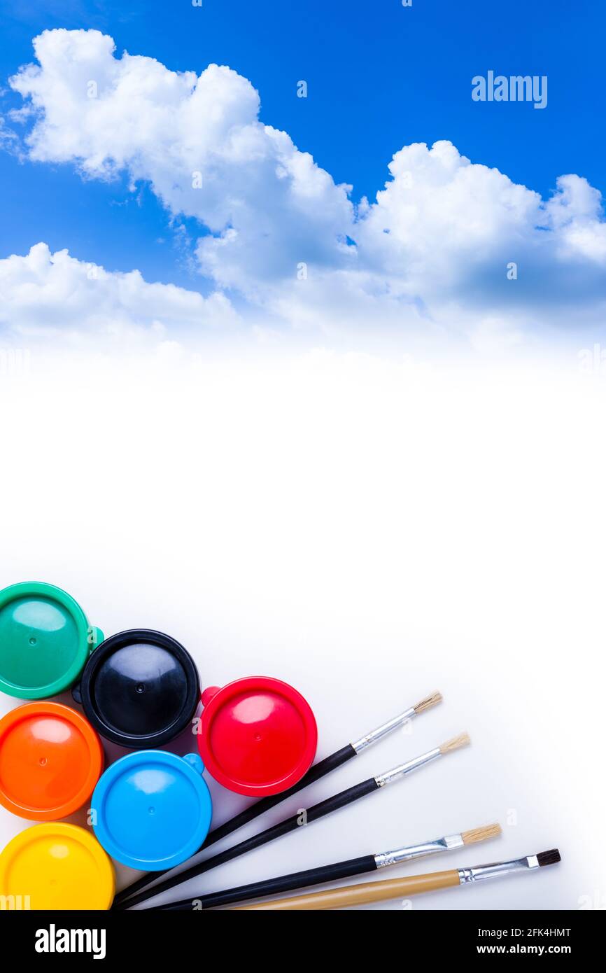 Multicolored drawing instruments (watercolor paints, paintbrush) for ...