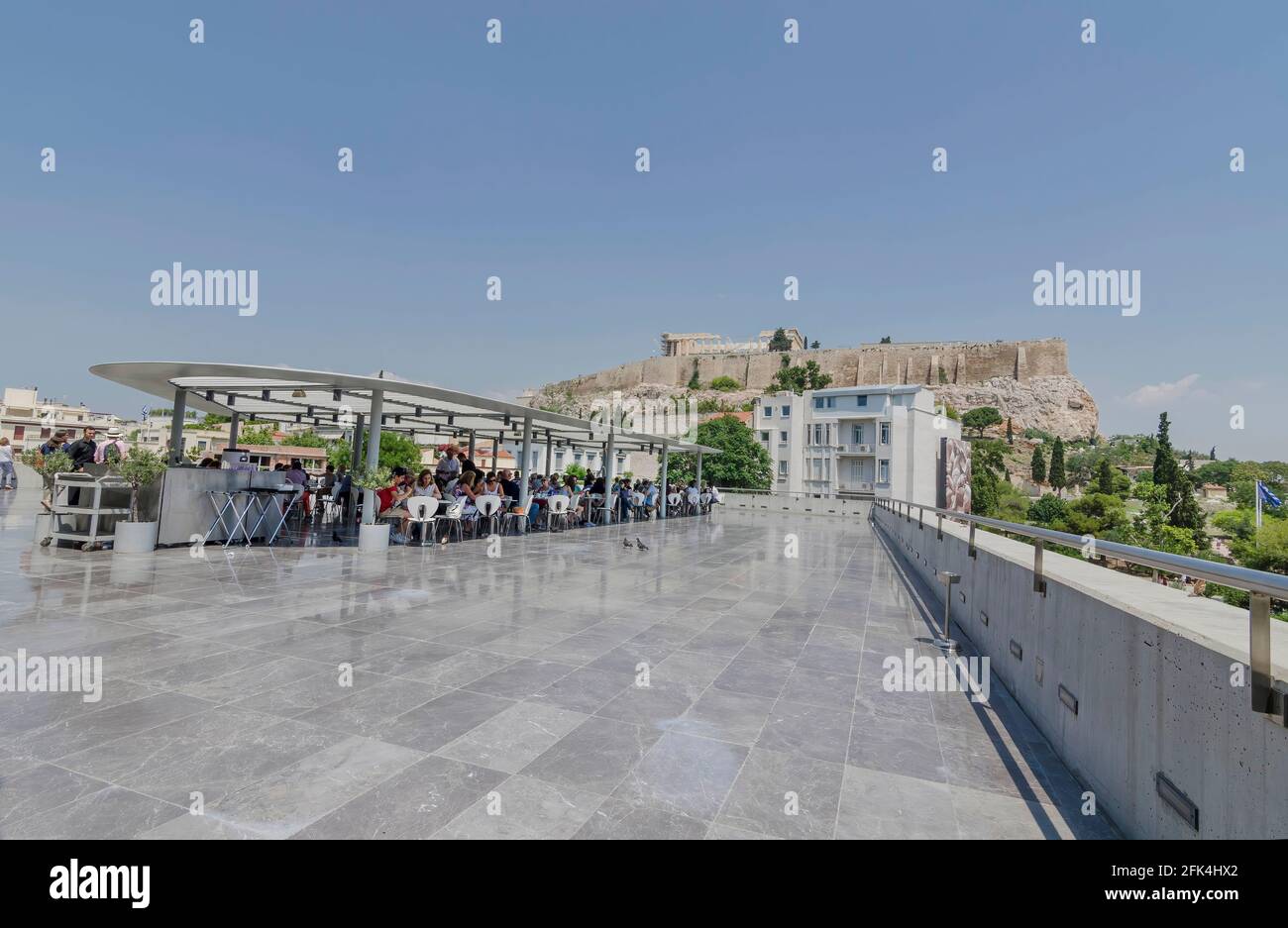 Athens, Greece - June 17, 2017: people on the terrace on the new modern Acropolis Museum rooftop ...