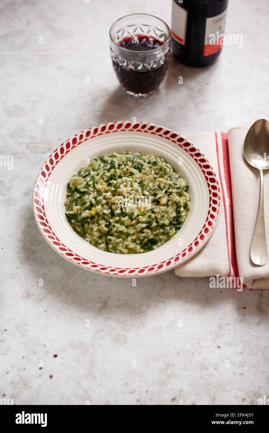 Risotto with spinach spring onions and sesame seeds Stock Photo - Alamy