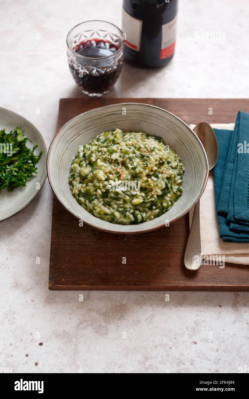 Risotto with spinach spring onions and sesame seeds Stock Photo - Alamy