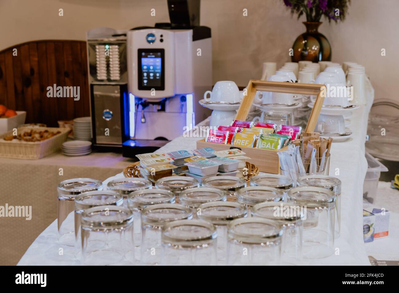Table with cups and teas for a coffee breaks Stock Photo - Alamy