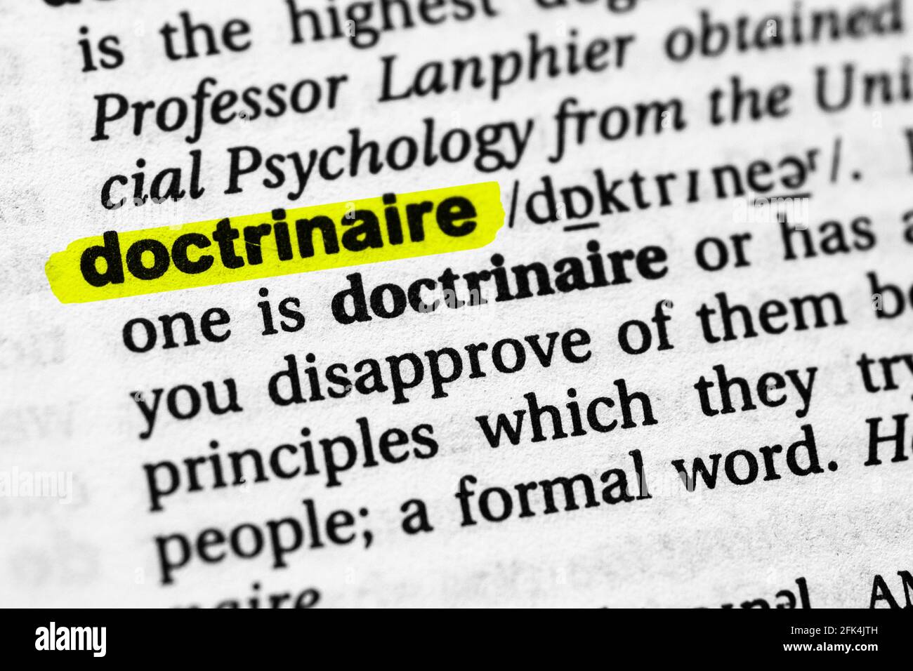 Highlighted word doctrinaire concept and meaning Stock Photo - Alamy