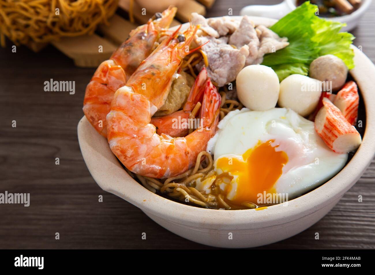 Clay Pot Yee Mee Seafood Noodle Soup with flavorful Cooked Ingredients ...