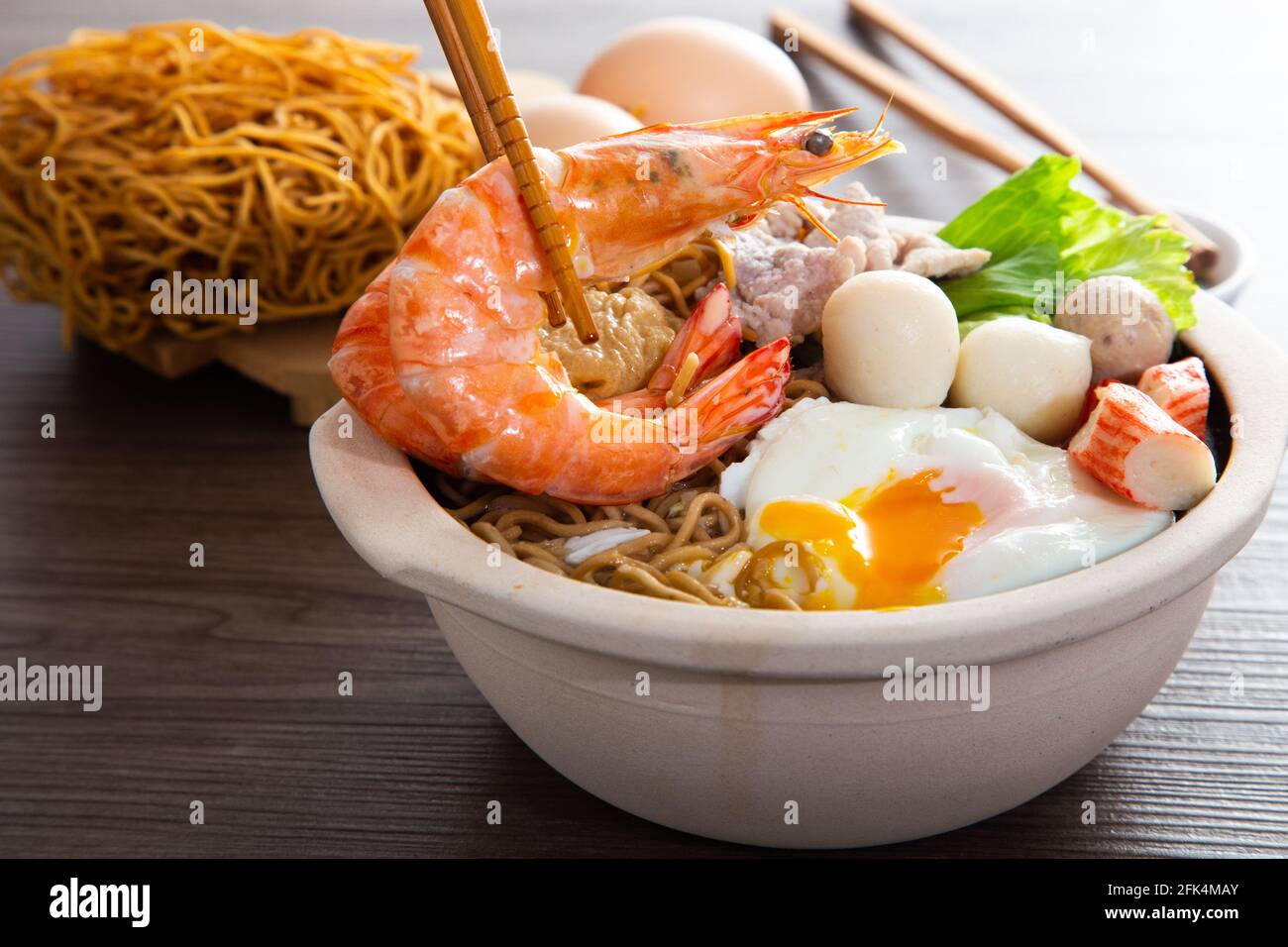 Clay Pot Yee Mee Seafood Noodle Soup with flavorful Cooked Ingredients ...