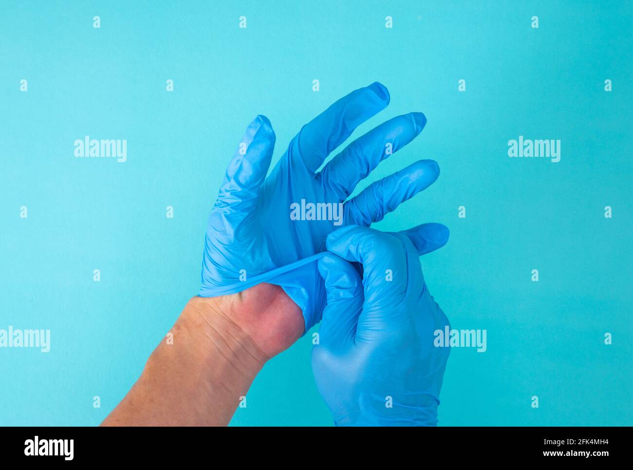 Pull off glove hi-res stock photography and images - Alamy