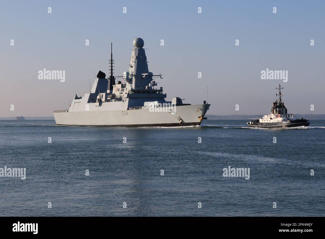 The tug SD BOUNTIFUL leads the Royal Navy Type 45 destroyer HMS DIAMOND ...