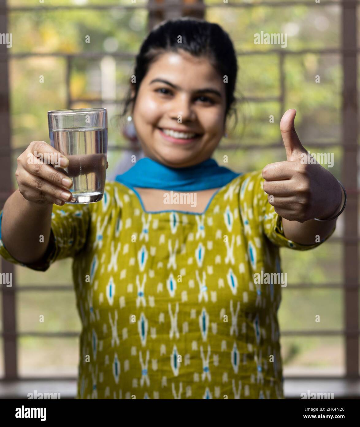 Indian woman showing thumbs up hi-res stock photography and images - Alamy