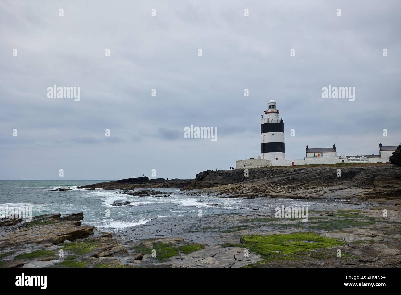 Waves hitting lighthouse hi-res stock photography and images - Alamy