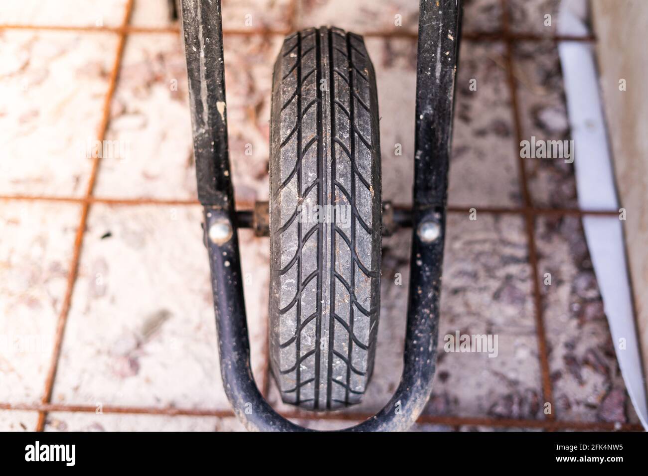 Construction material wheelbarrow with good tread Stock Photo - Alamy